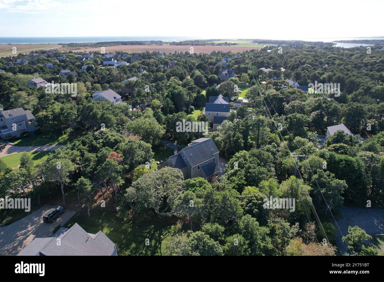 An aerial view of a coastal neighborhood on a sunny day in Edgartown on ...