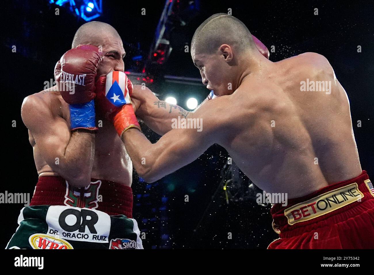 Puerto Rico's Xander Zayas, right, punches Mexico's Damian Sosa during ...