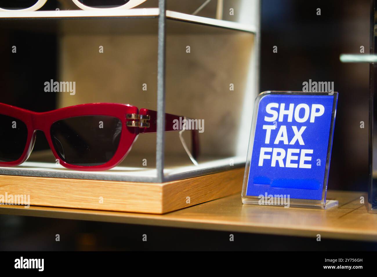 shop tax free text duty free shop sign on shop window Stock Photo - Alamy