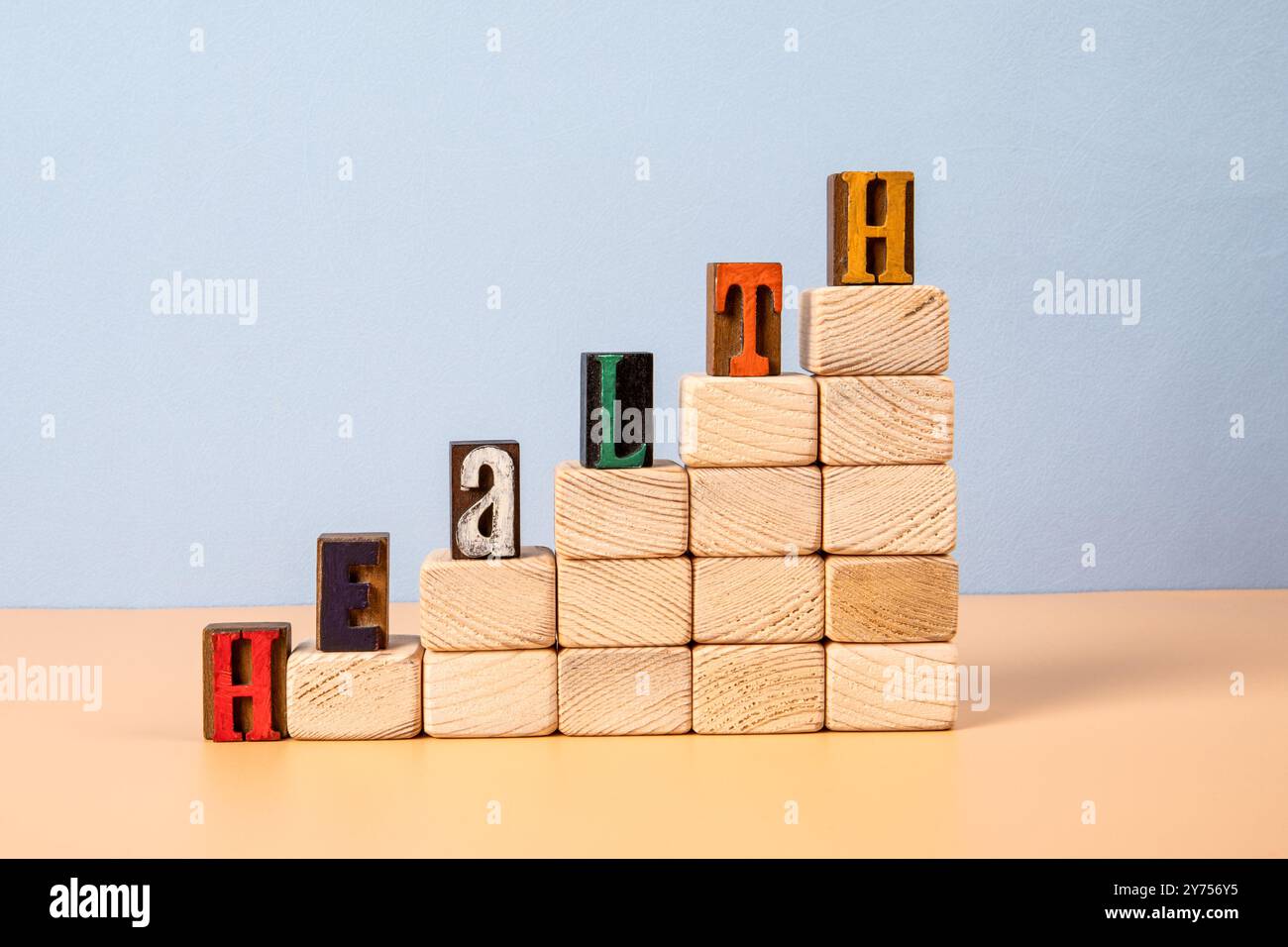 HEALTH. Wooden blocks and the alphabet. Development concept Stock Photo ...