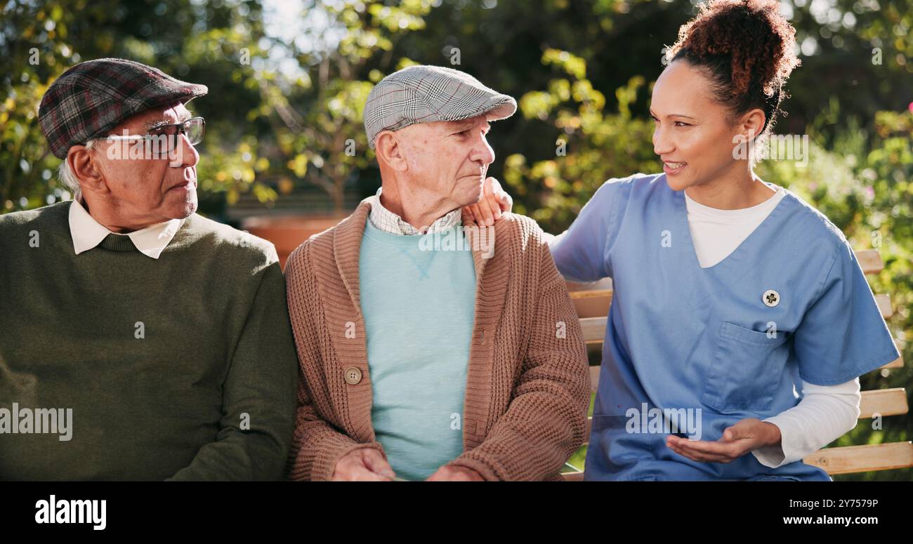 Nurse, senior men and talking for consulting, daily schedule and wellness in nursing home ...