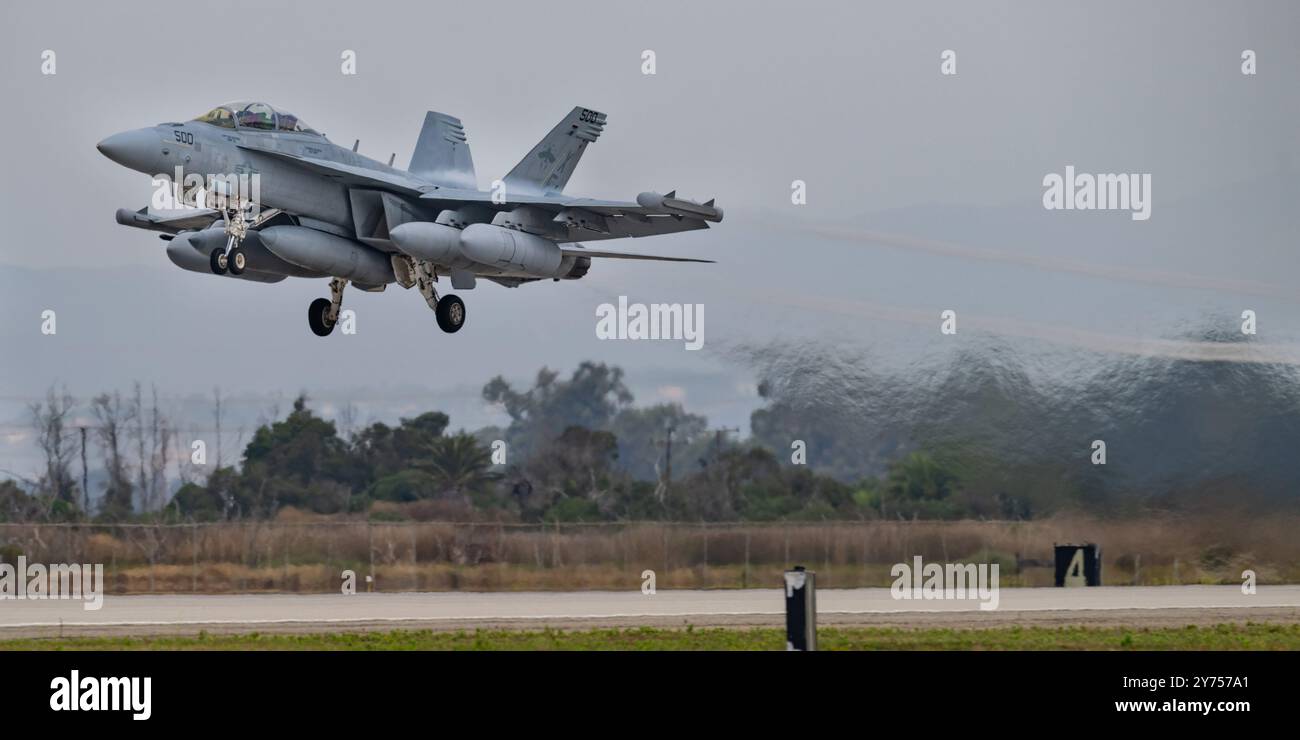 Loaded with external fuel tanks, an EA-18G Growler attached to the U.S ...