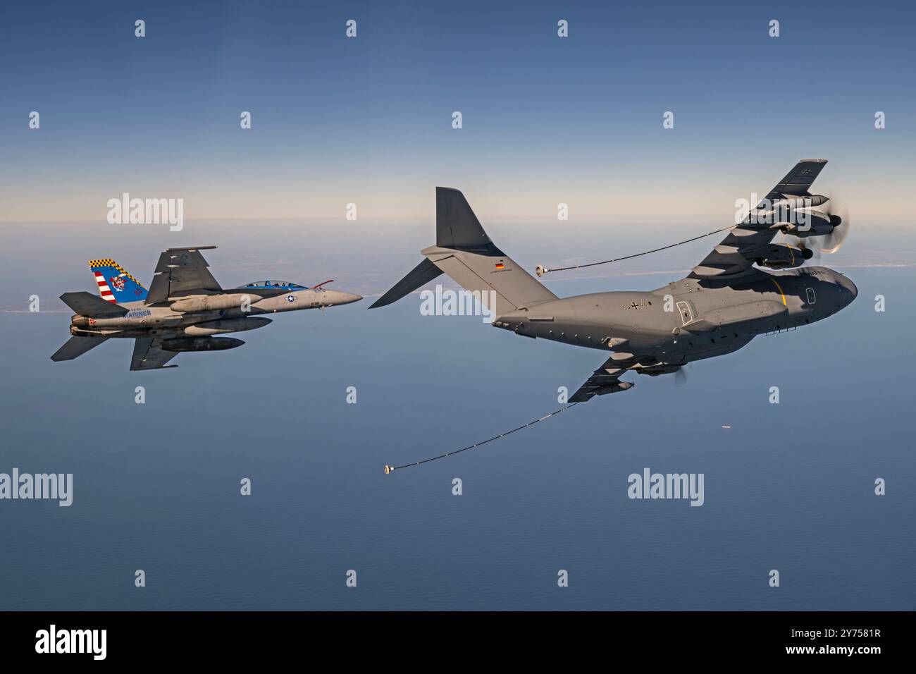 Air Test and Evaluation Squadron (VX) 23 flies an F/A-18F alongside a ...