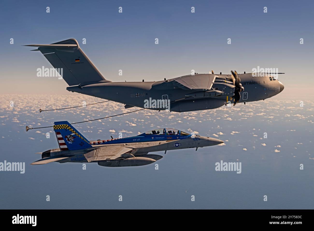 Air Test and Evaluation Squadron (VX) 23 flies an F/A-18F alongside a ...