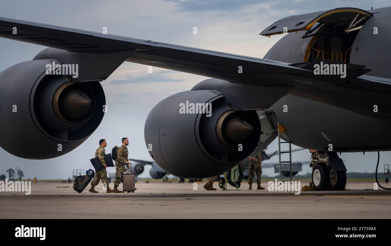 Airmen assigned to the 6th Air Refueling Wing board a KC-135 ...
