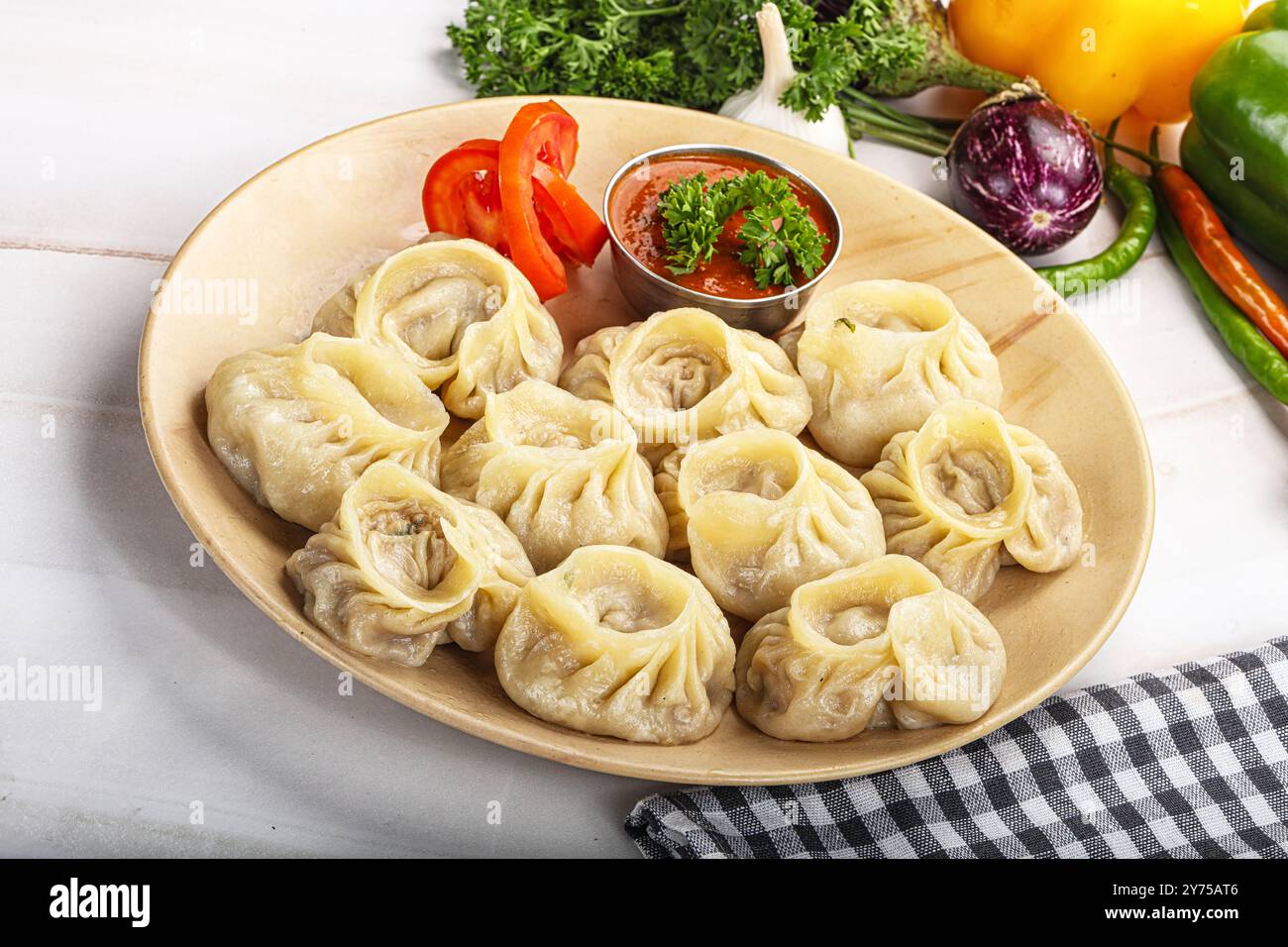 Steamed Nepali dumpling Momo with sauce stuffed chicken, meat, seafood ...