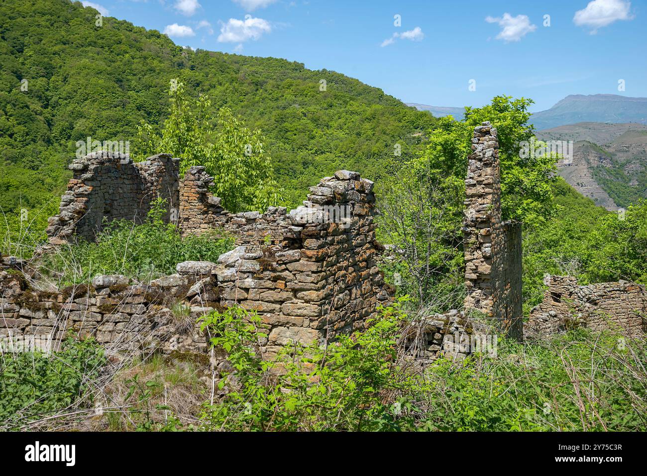 On the ruins of the abandoned village of Kala-Koreish (capital of the ...