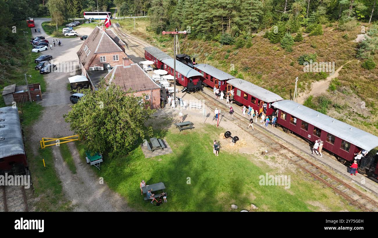 the old steam train from Vrads to Bryrup in denmark with passengers ...