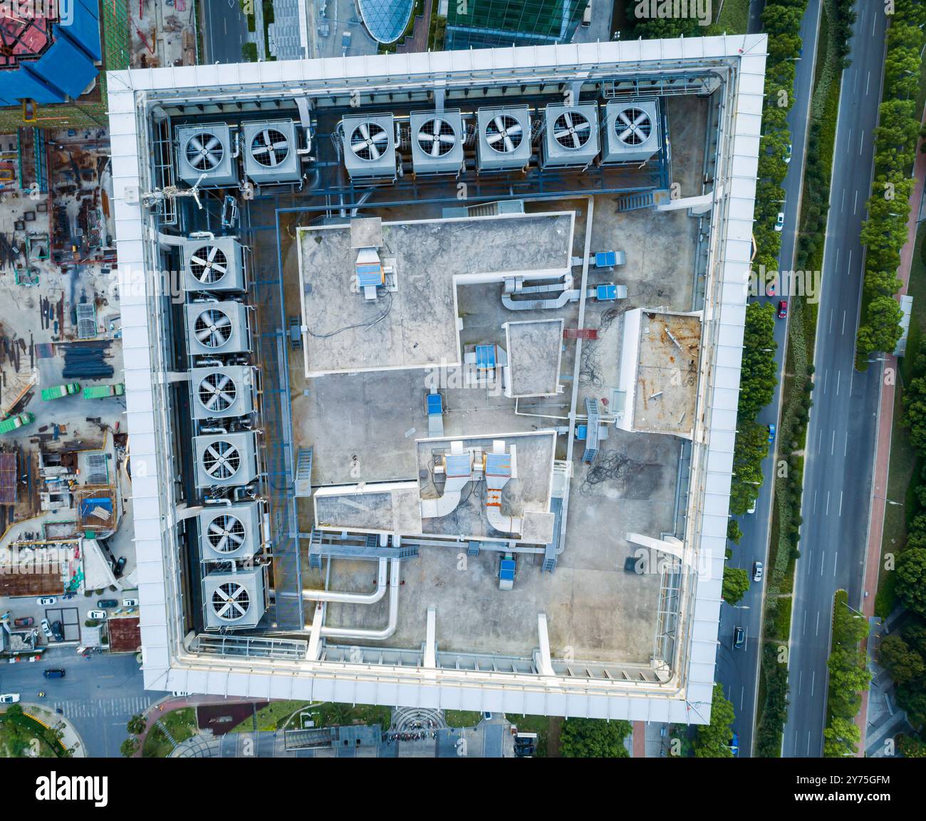 Aerial view of a commercial building rooftop with industrial air ...