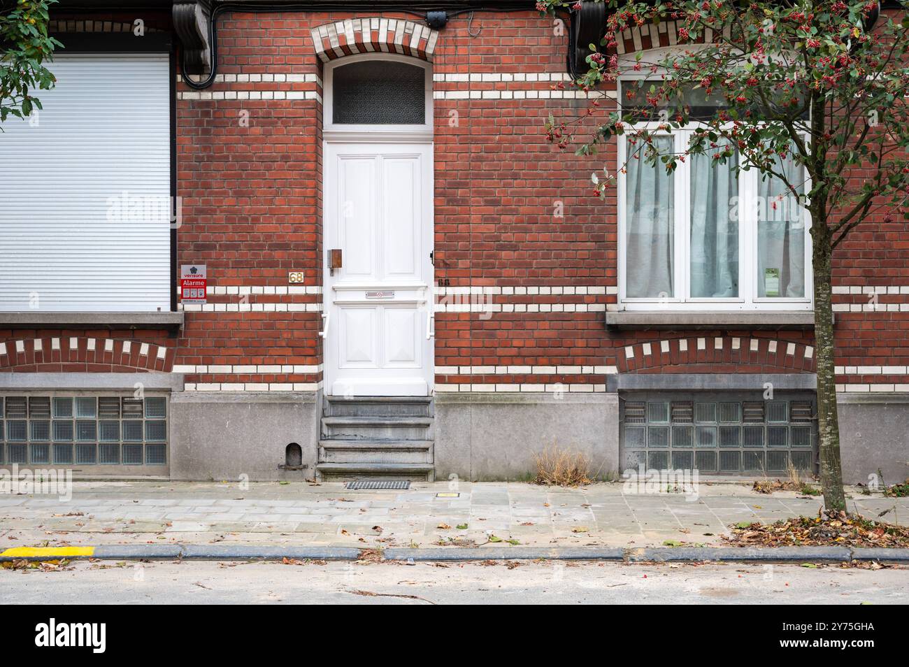 Brick stone facades of residential houses in a row, Jette, Brussels ...