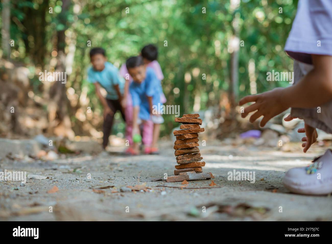 kid hand playing traditional stacking game Stock Photo - Alamy