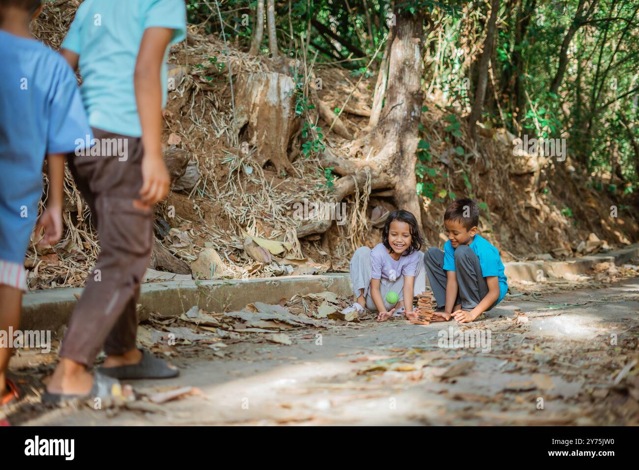 indonesian kids playing traditional games in the village Stock Photo ...