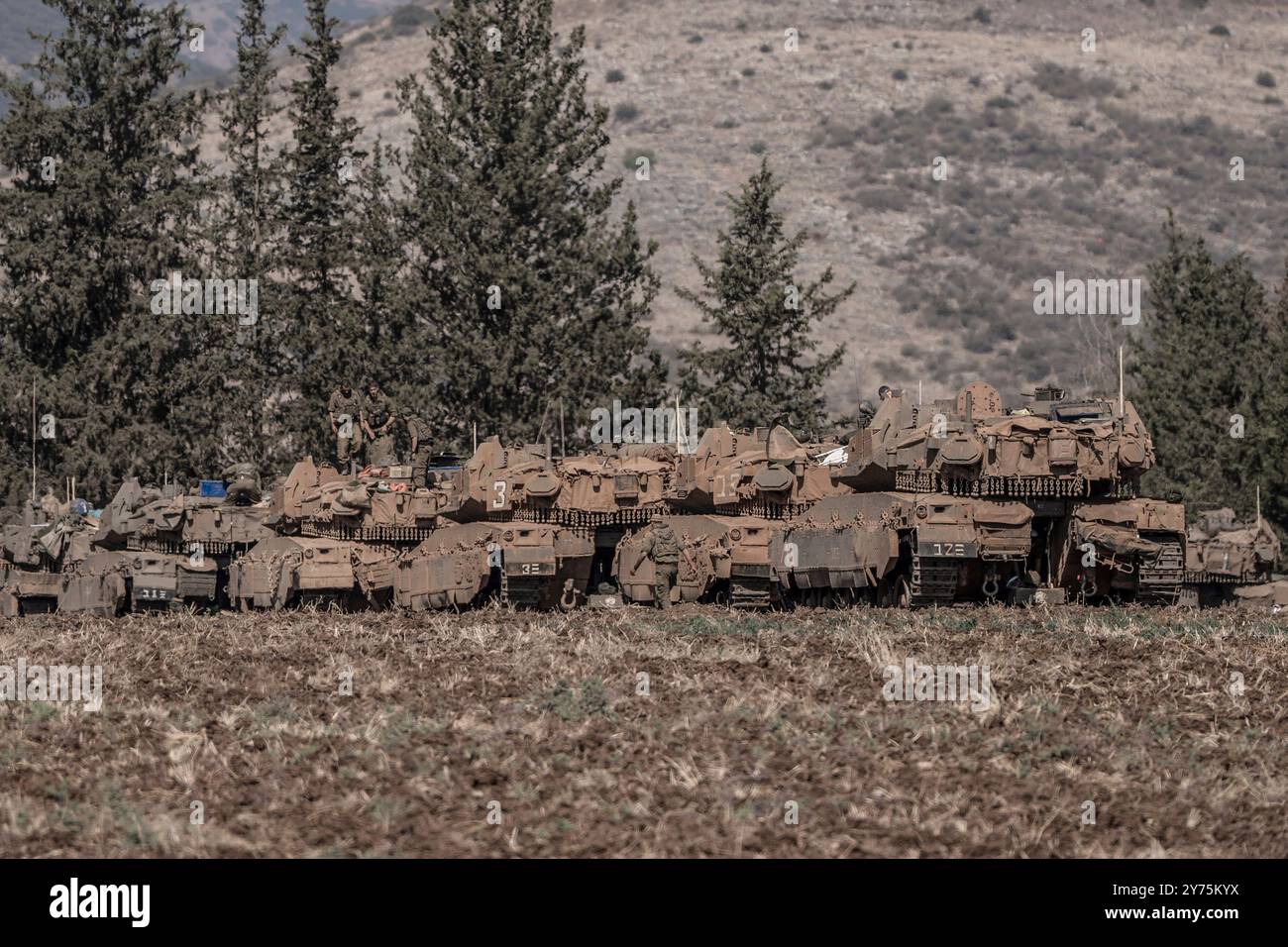 Israel. 28th Sep, 2024. Israeli military tanks gather by the Israeli ...