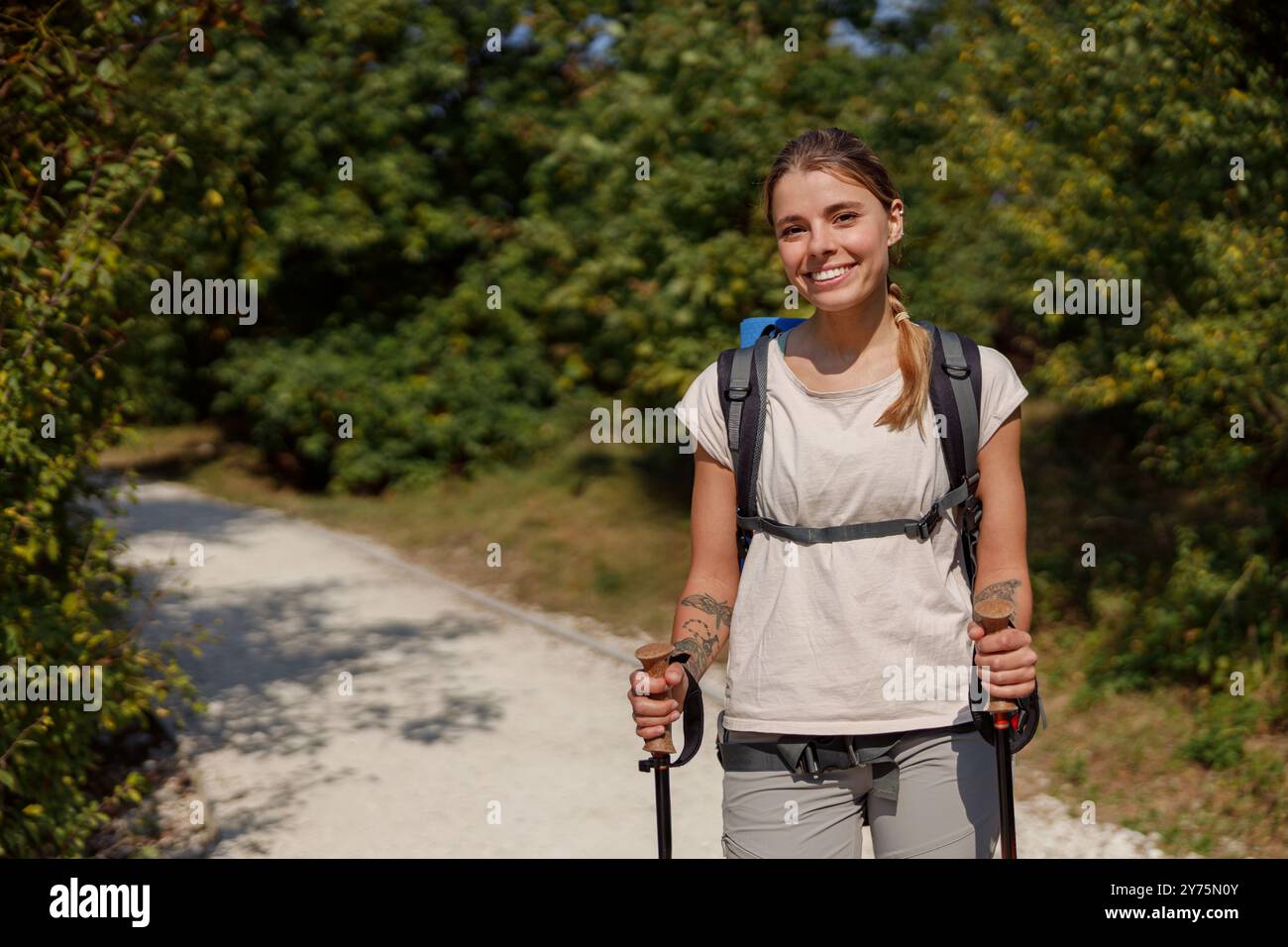 A Young Woman Enjoying Hiking on a Beautiful and Scenic Outdoor Trail ...