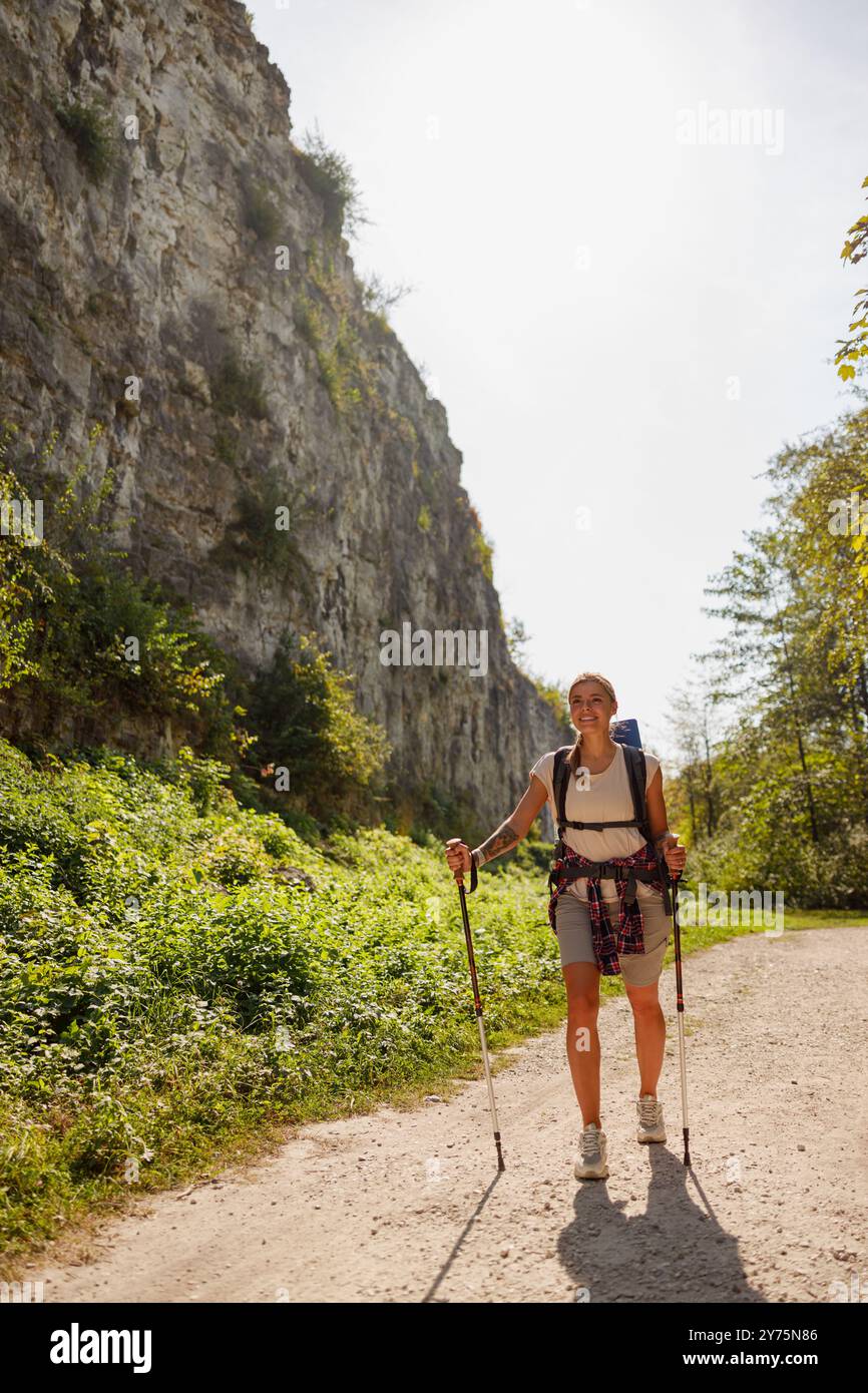 A Hiker Happily Enjoying a Beautiful and Scenic Trail, Immersed in ...