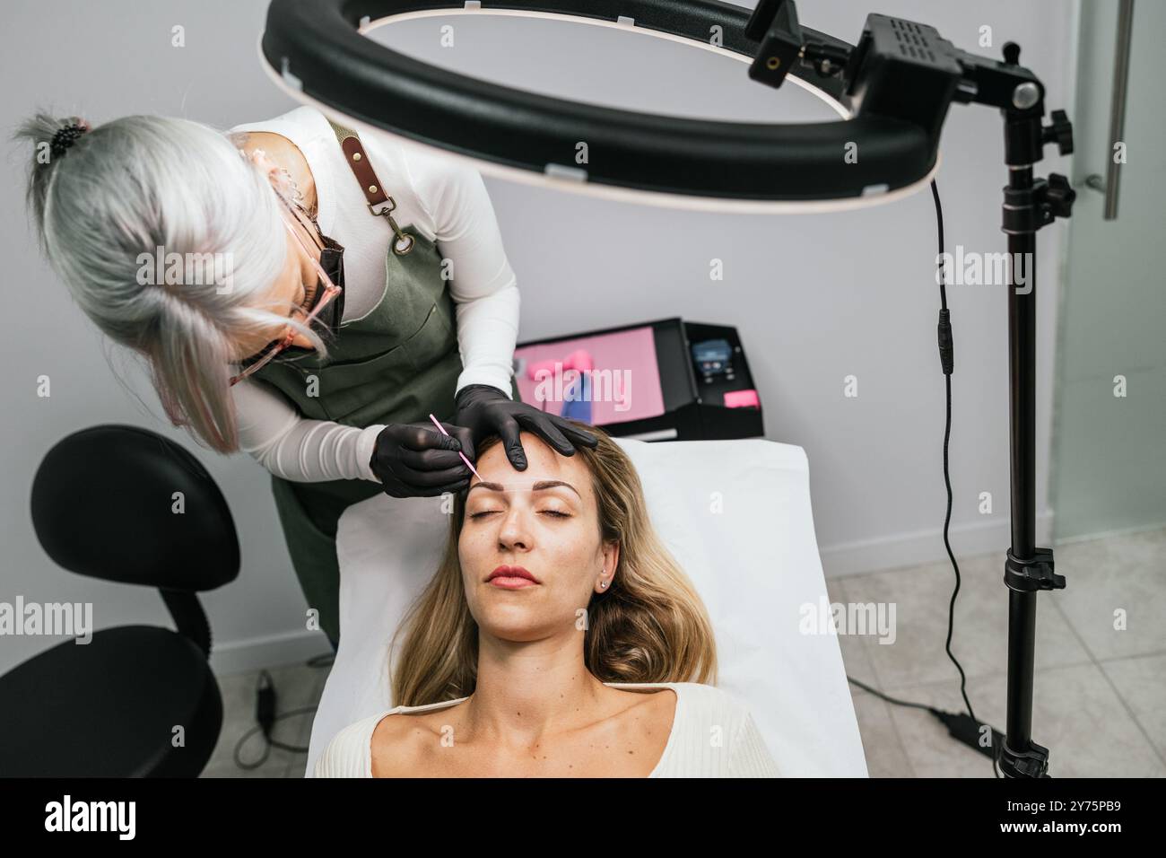 Preparation for microblading, eyebrow design and makeup Stock Photo - Alamy