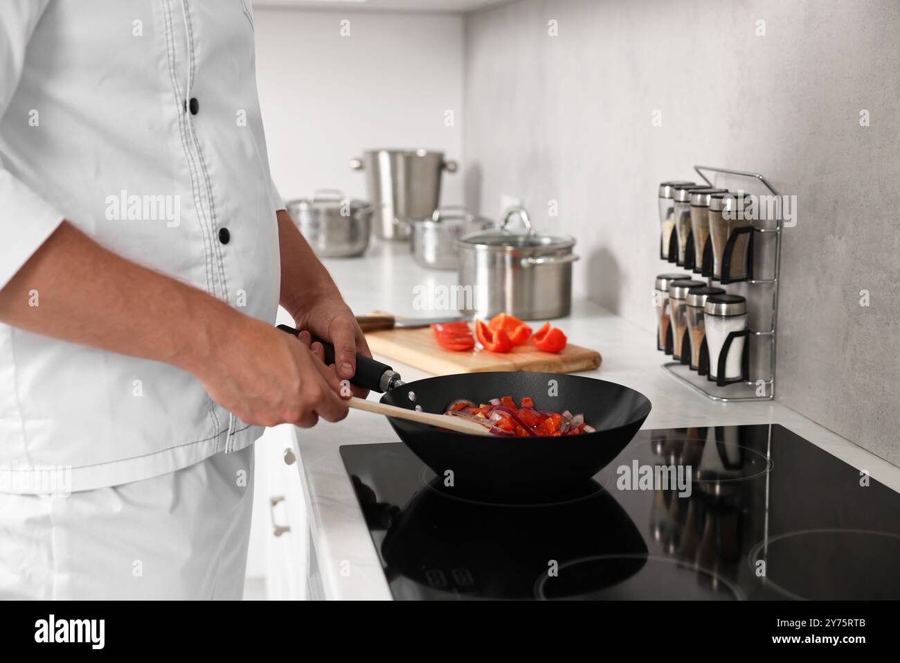 Professional chef wok spatula hi-res stock photography and images - Alamy