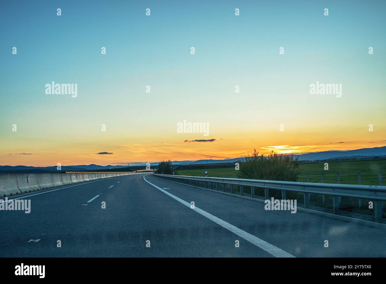 View of the highway from car during sunset. High quality photo Stock ...