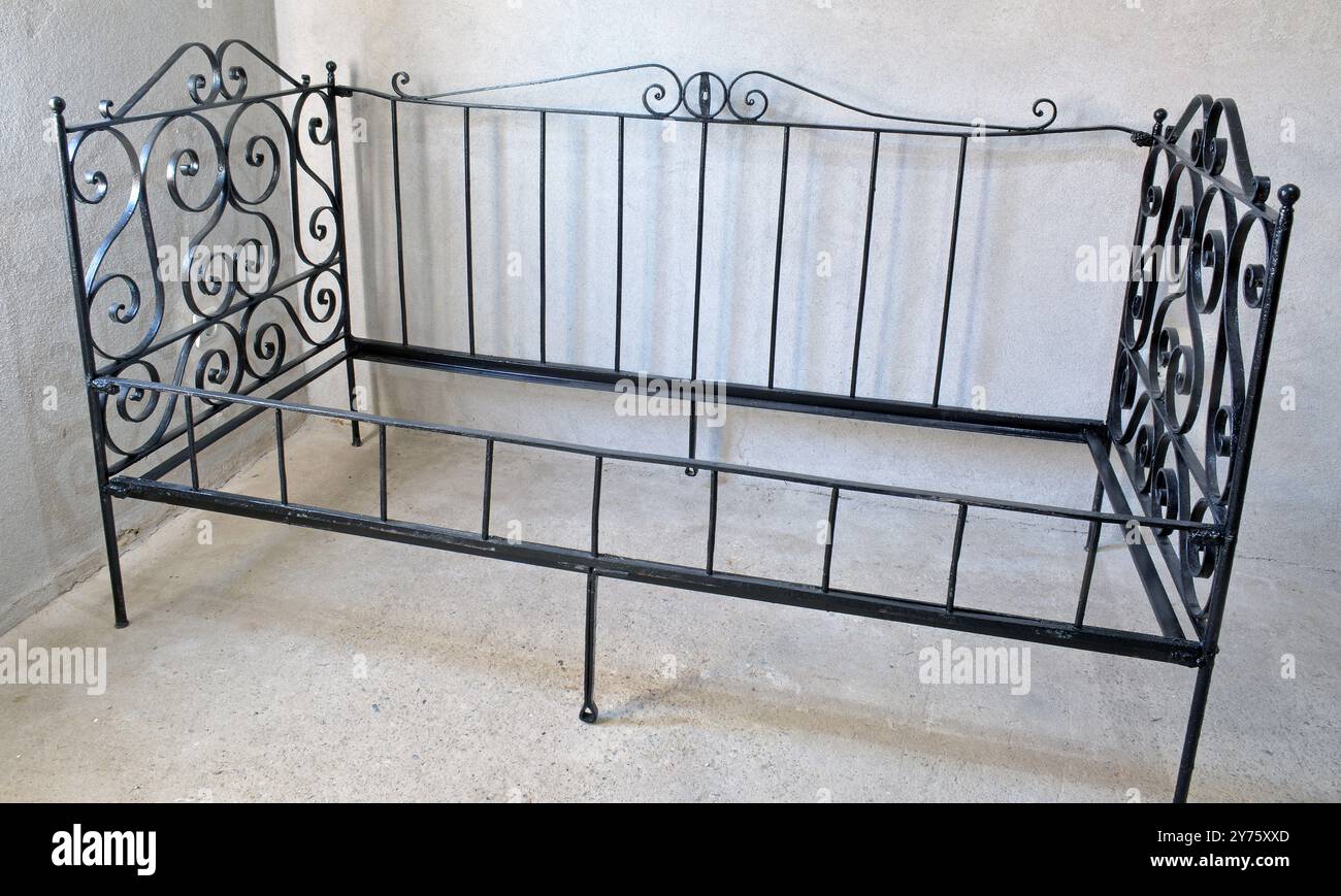 Ancient bed construction made of forged iron Stock Photo - Alamy