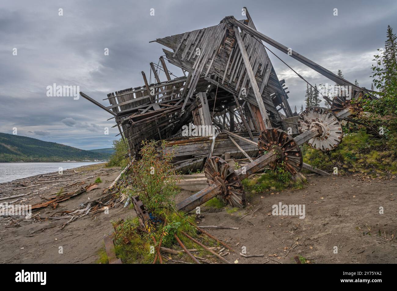 Remains of a paddle wheel from a riverboat wreck on the banks of the ...