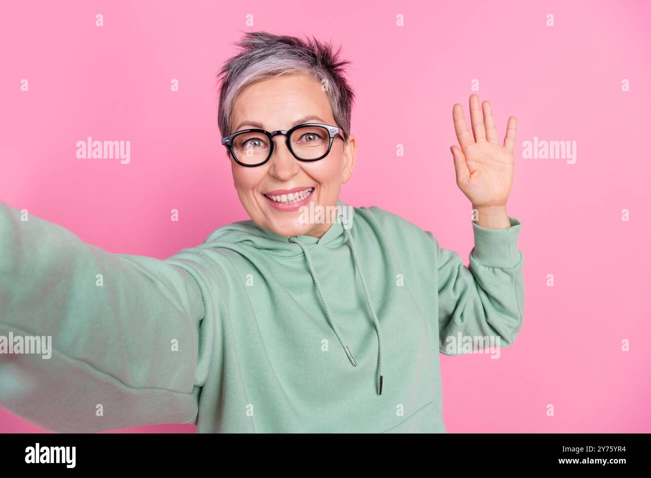 Photo of charming attractive lady wear khaki hoodie tacking selfie ...