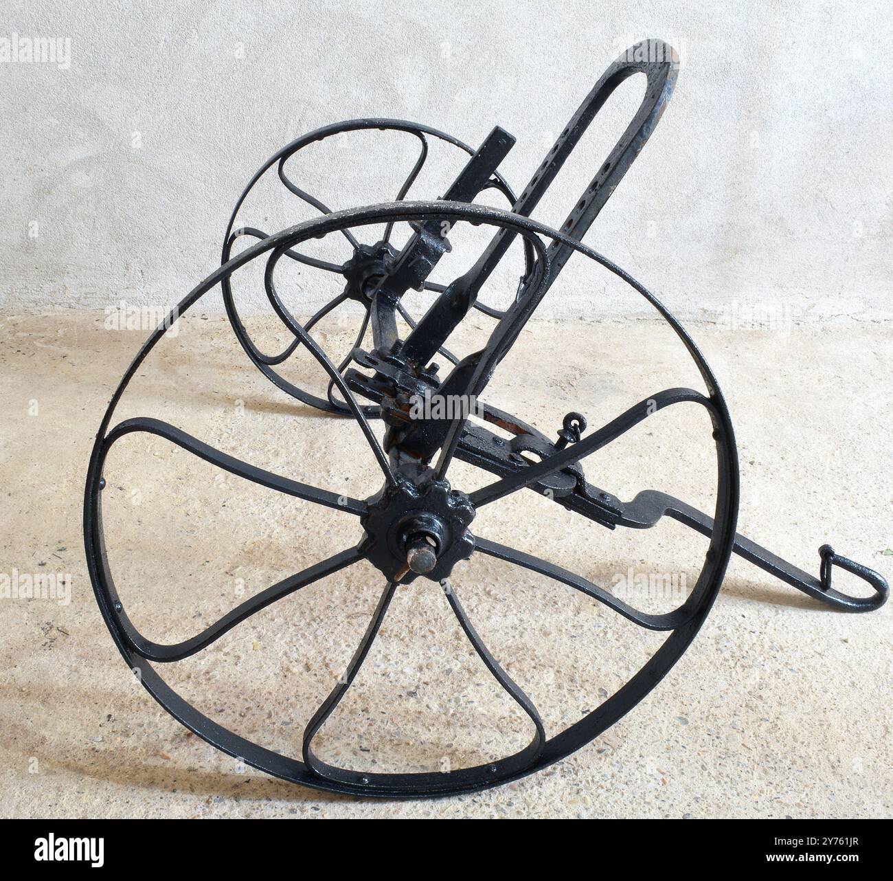 Ancient black iron plow tool used in farming for cultivation of soil in ...