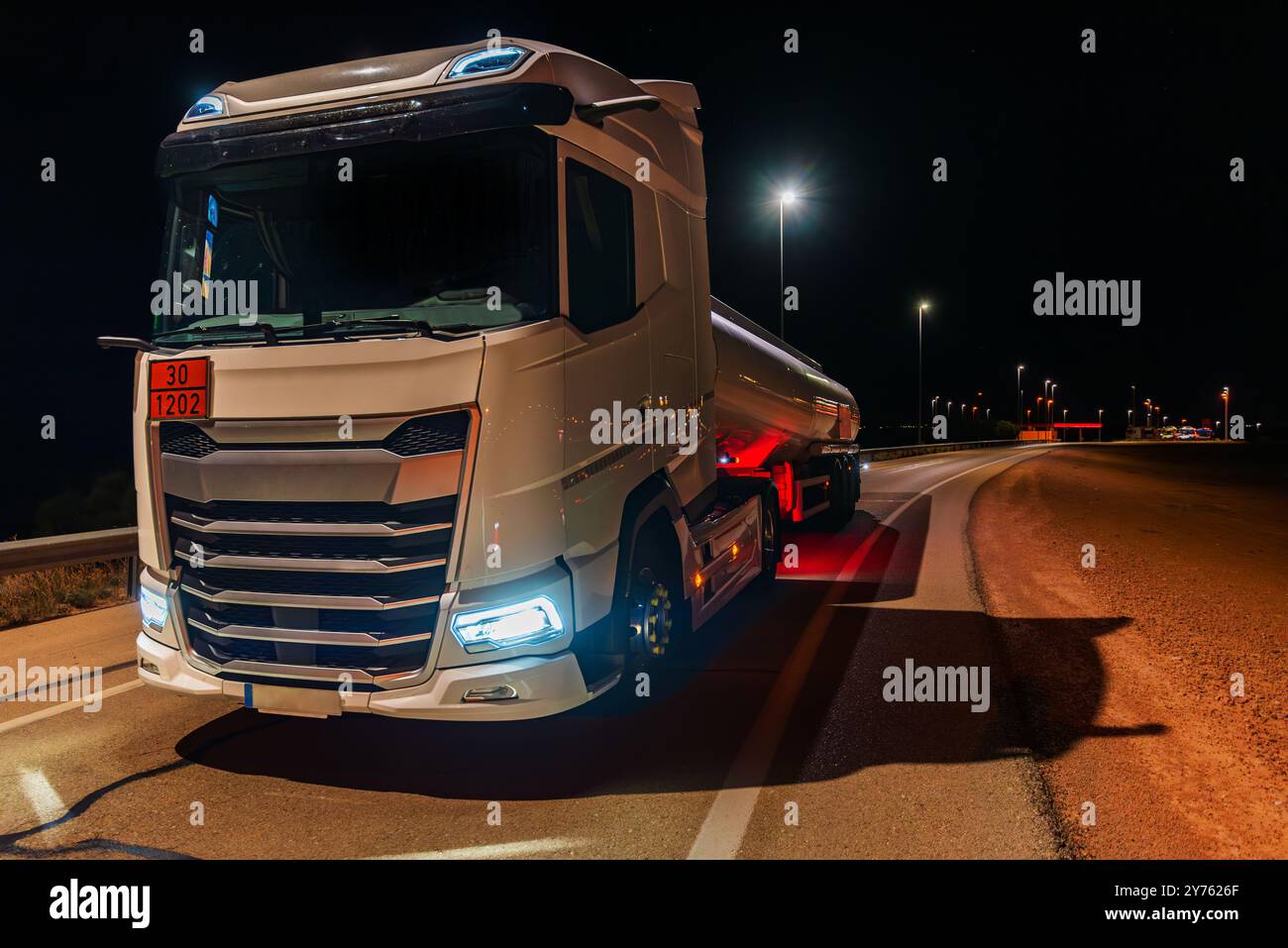 Fuel tanker truck with orange license plate number 30, diesel, leaving ...