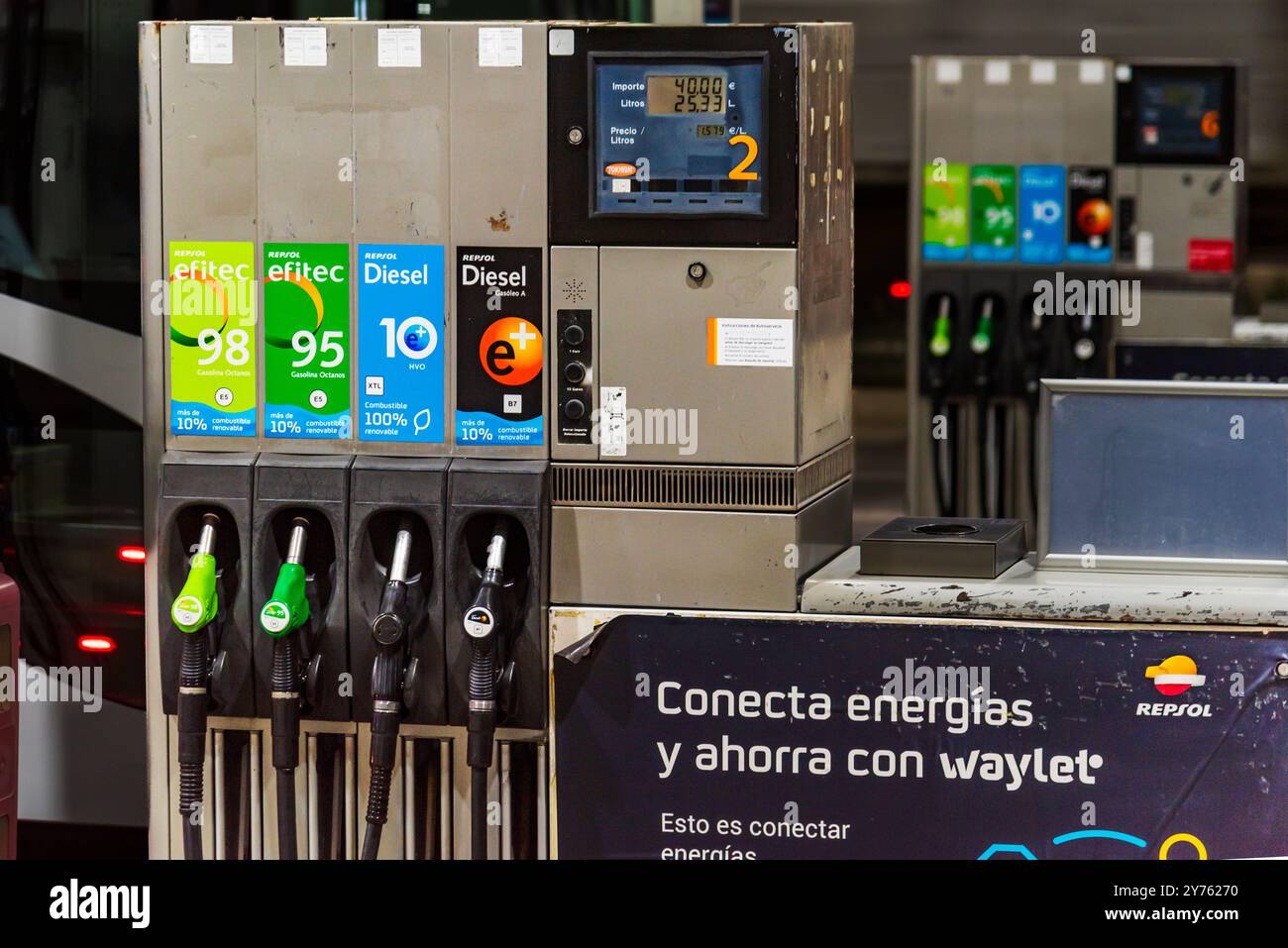 Repsol company's dispensing apparatus with several nozzles, one of them ...