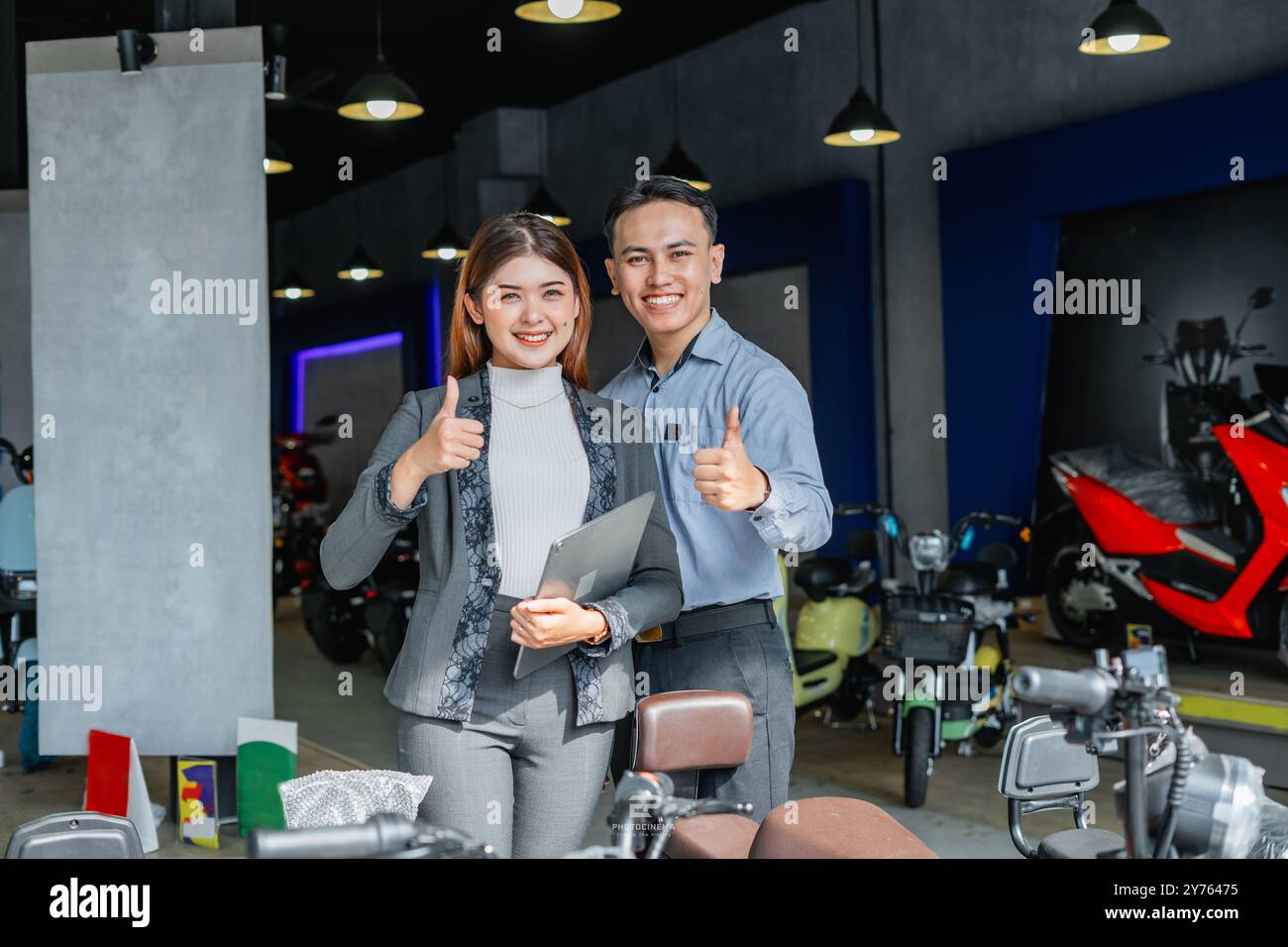 business people standing with thumb up gesture Stock Photo - Alamy