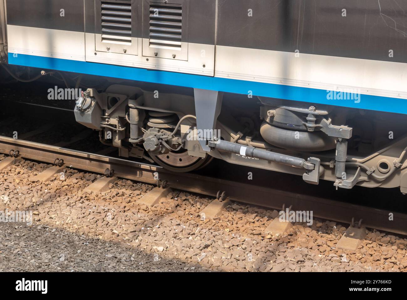 Modern passenger train wheels closeup detail shot side view, nobody ...