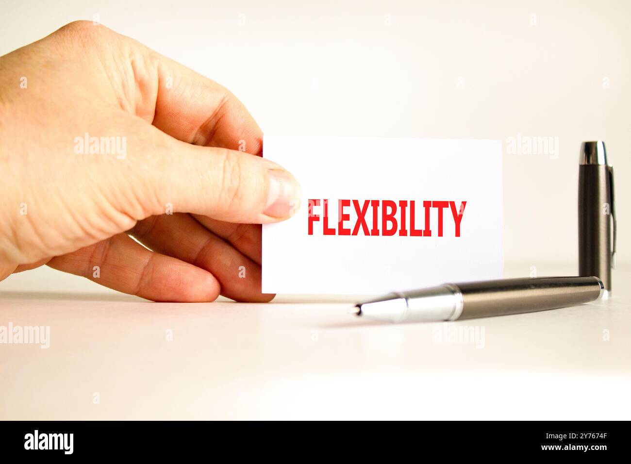 Flexibility symbol. Concept word Flexibility on beautiful white card ...
