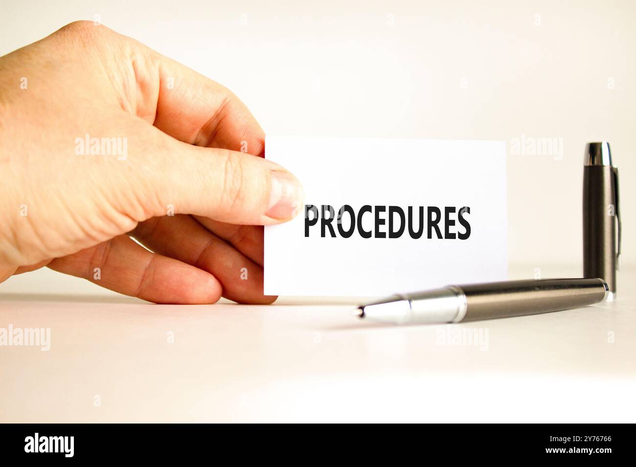 Procedures symbol. Concept word Procedures on beautiful white card ...