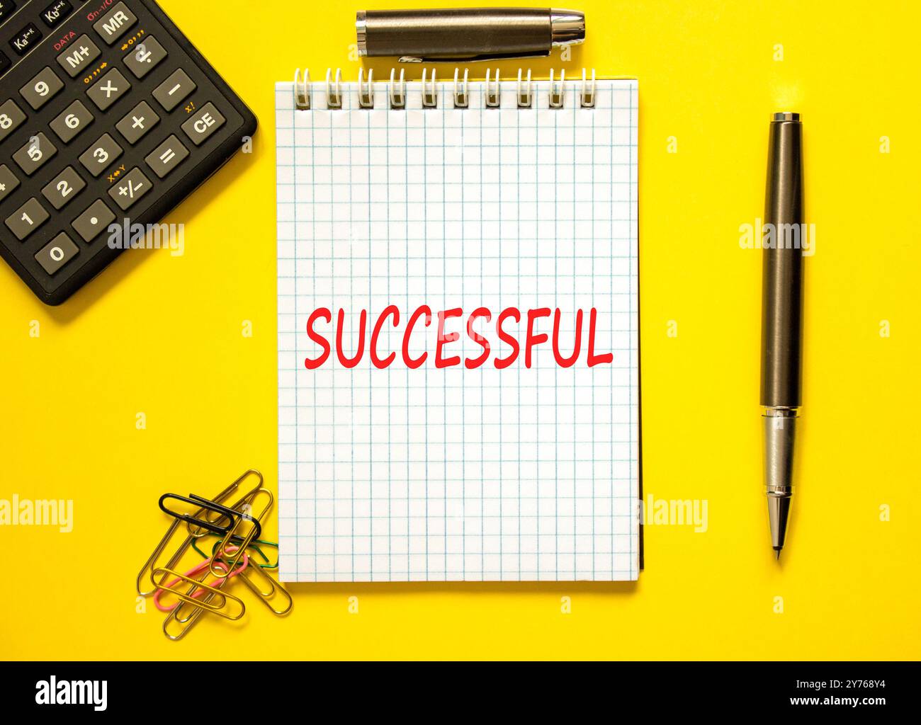 Successful symbol. Concept word Successful on beautiful white note ...