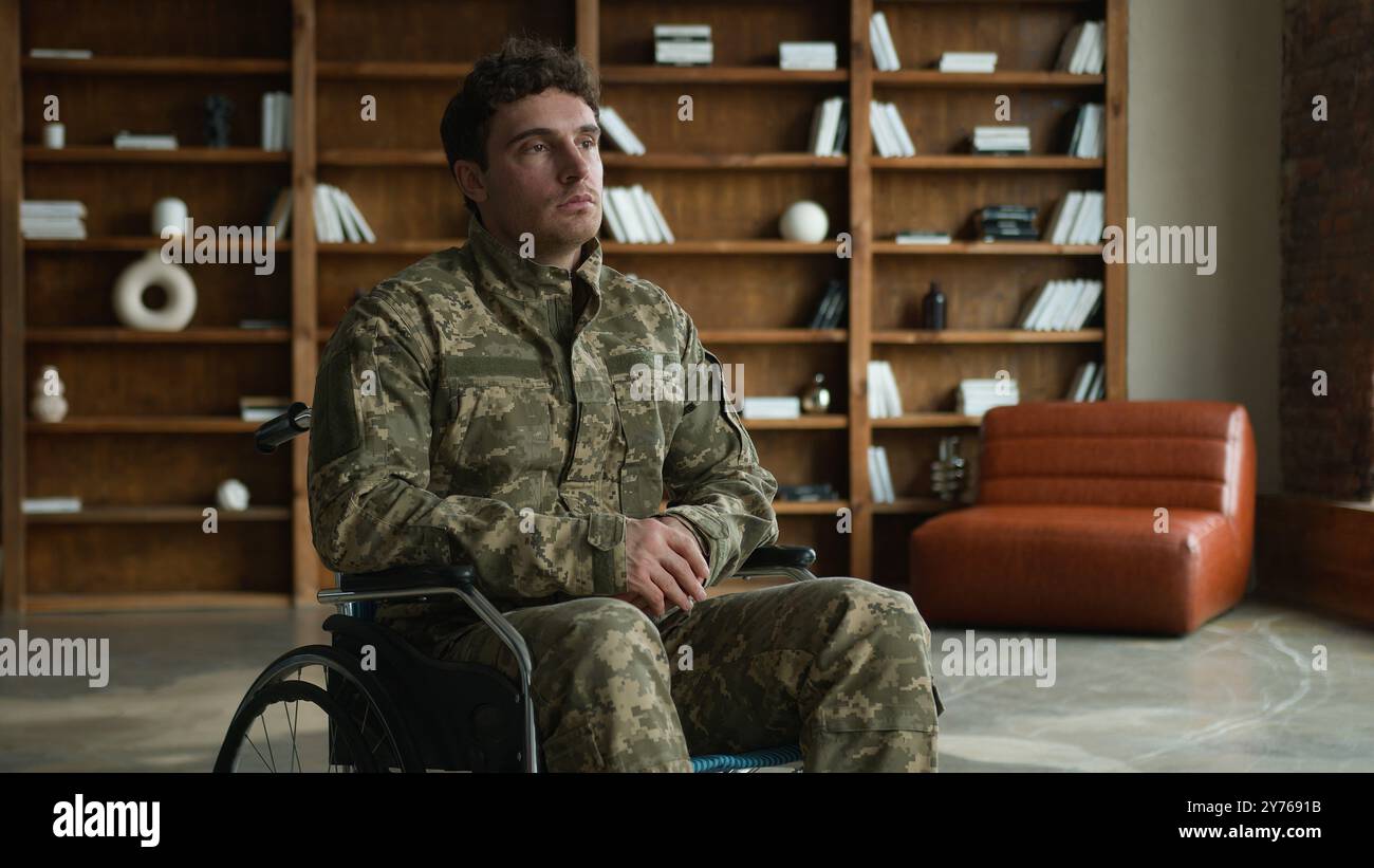 Sad pensive depressed young Caucasian male military officer veteran ...