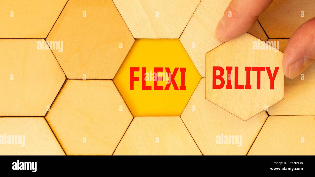 Flexibility symbol. Concept word Flexibility on beautiful wooden ...