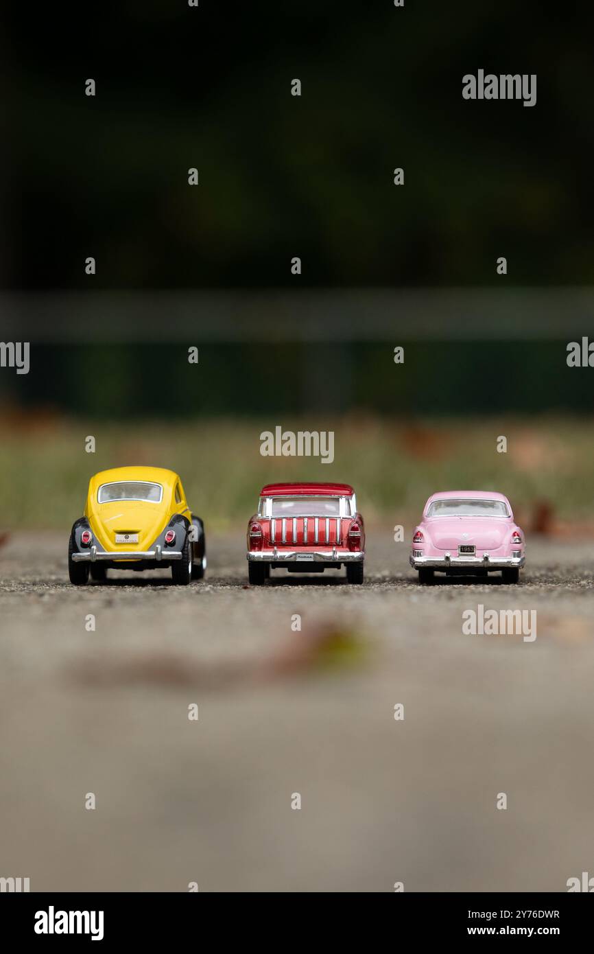 Woodbridge, New Jersey - September 27, 2024: Three diecast toy cars, a ...