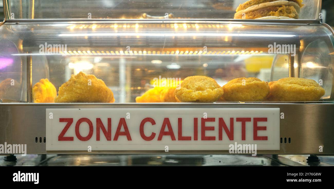 warm fried food in colombian bus station Stock Photo - Alamy