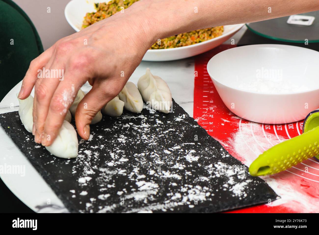Sculpt dumplings. Traditional Russian cuisine. National dish. Hand ...