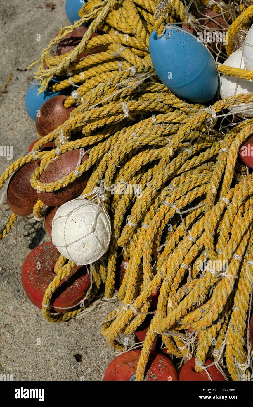 Colorful fishing nets with float line Stock Photo - Alamy