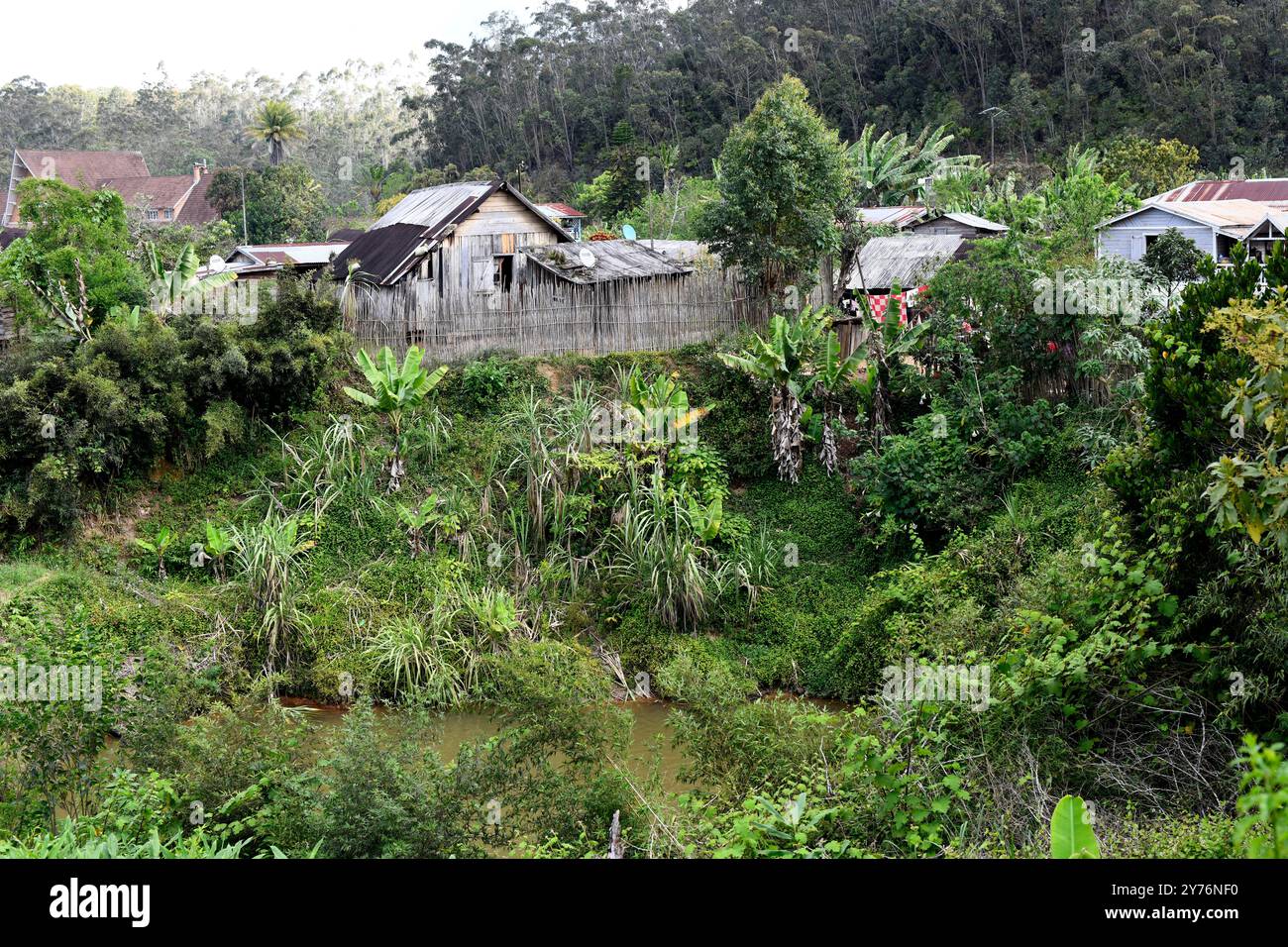 Andasibe, rural municipality. Traditional wood house next to river. Moramanga, Alaotra-Mangoro ...