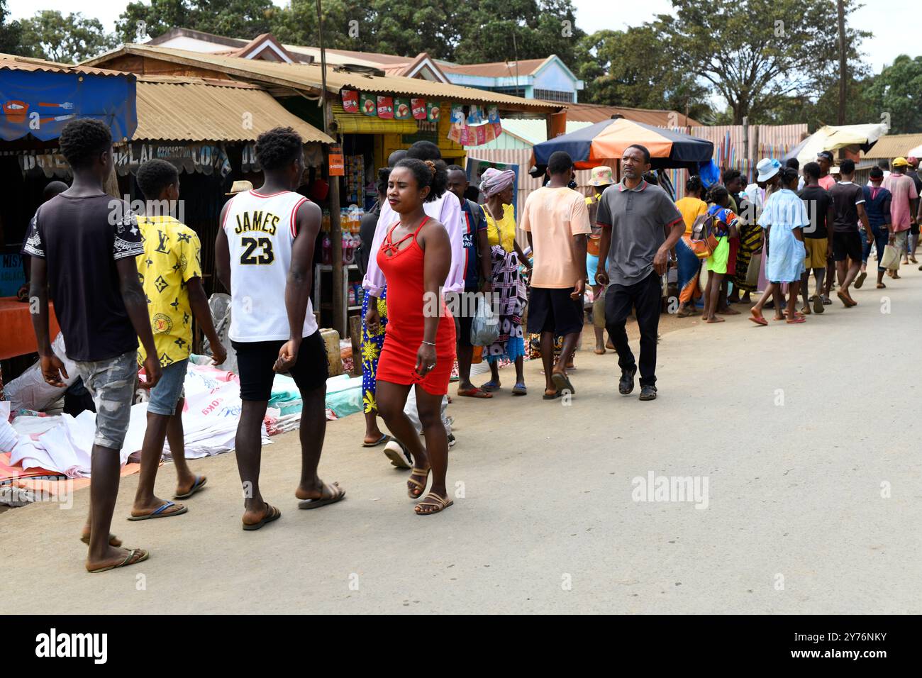 Diana region, street market. People with traditional and occidental ...