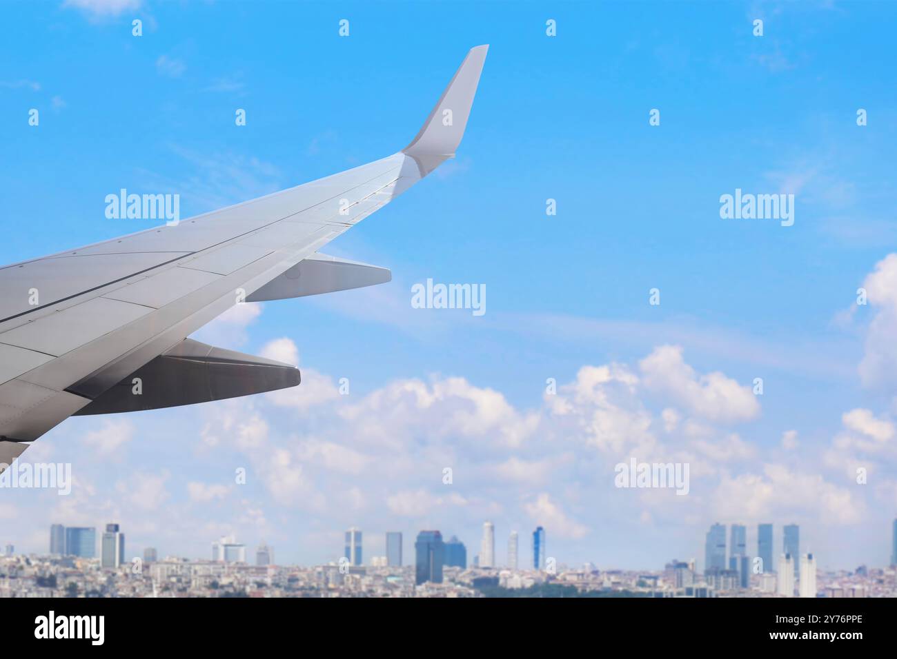 Airplane taking off or landing, view on city from window Stock Photo ...