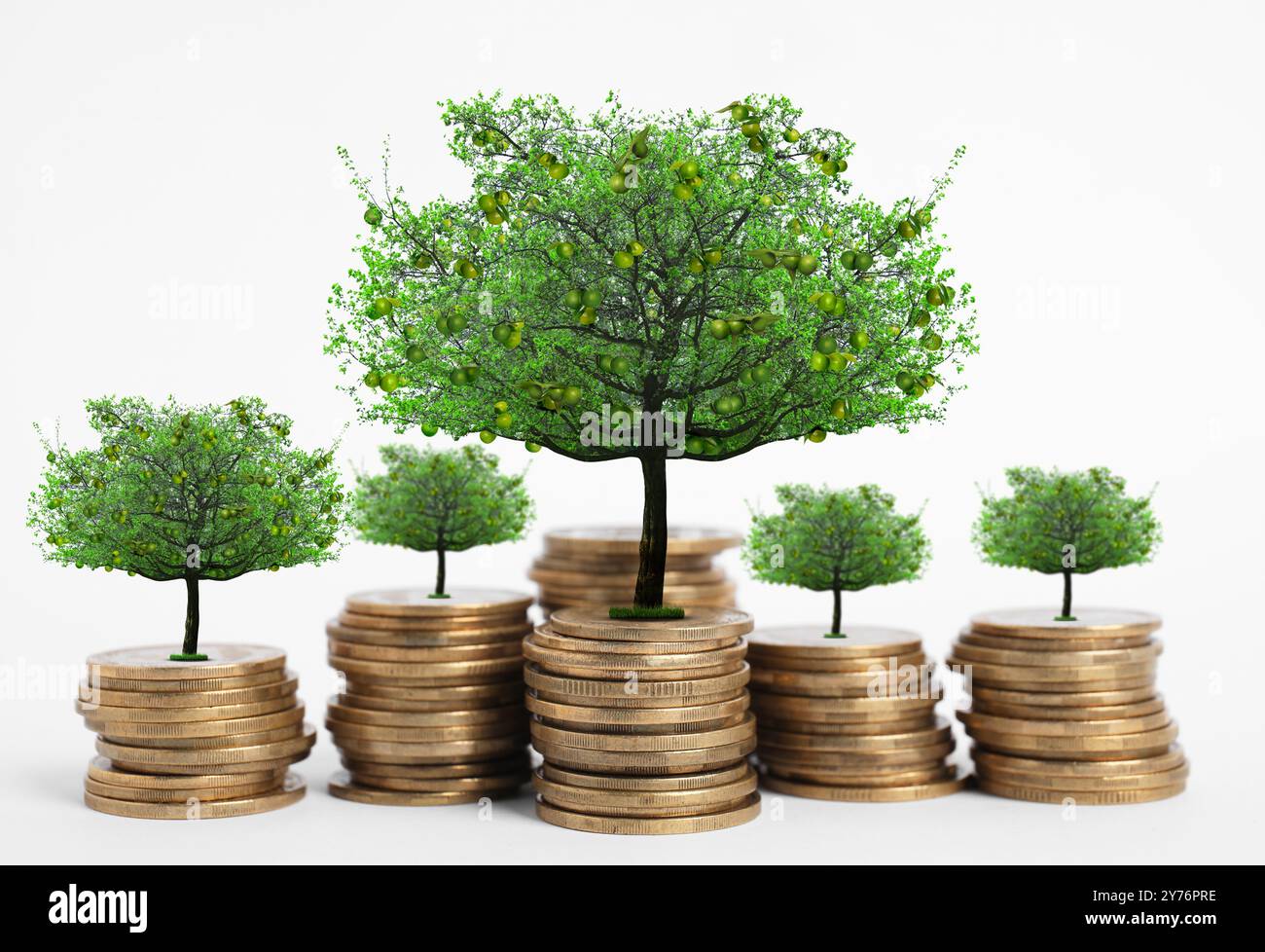 Stacked coins with tiny green trees on white background Stock Photo - Alamy