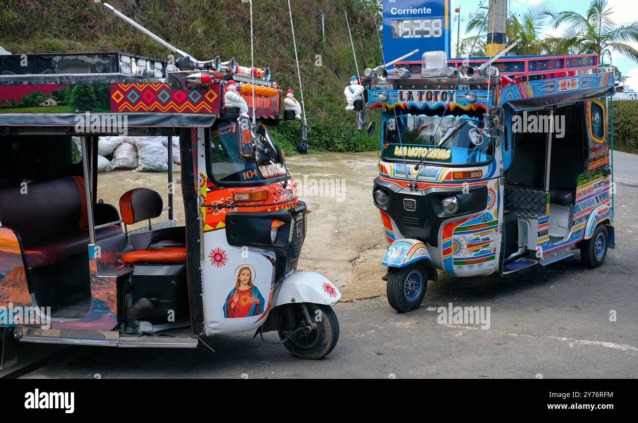 tuk tuk parked in main square of Guatape, Colombia Stock Photo - Alamy