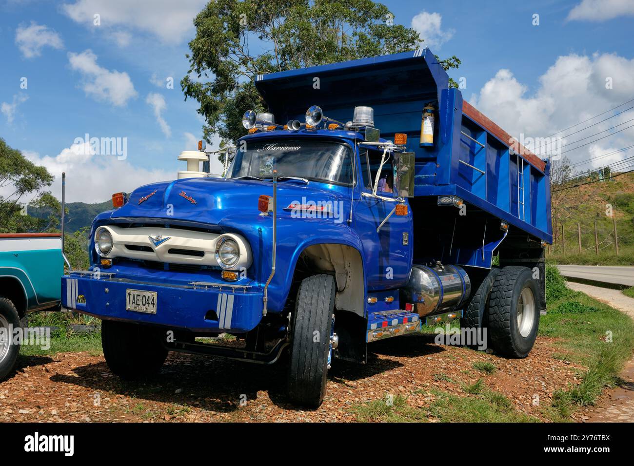 Vintage American custom blue dump truck Stock Photo - Alamy