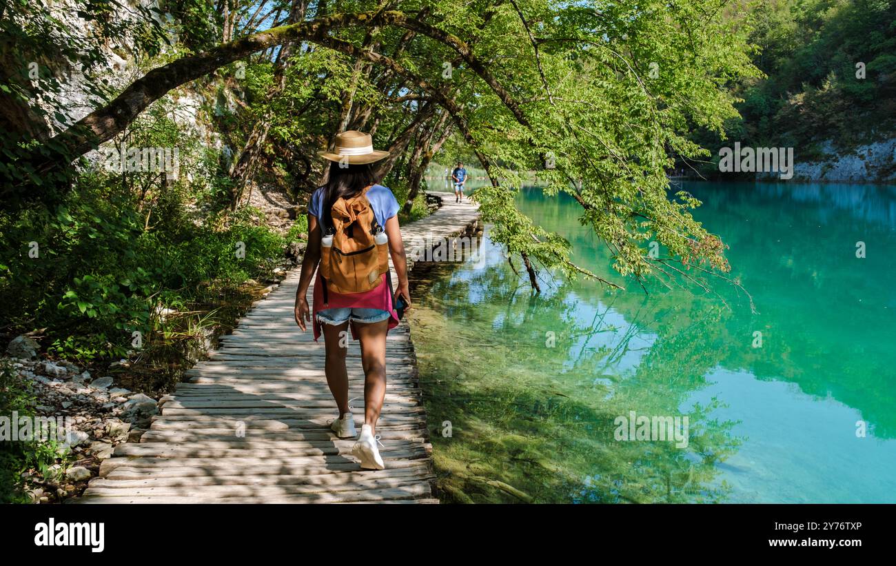 Walking along the tranquil wooden pathways, visitors are immersed in ...