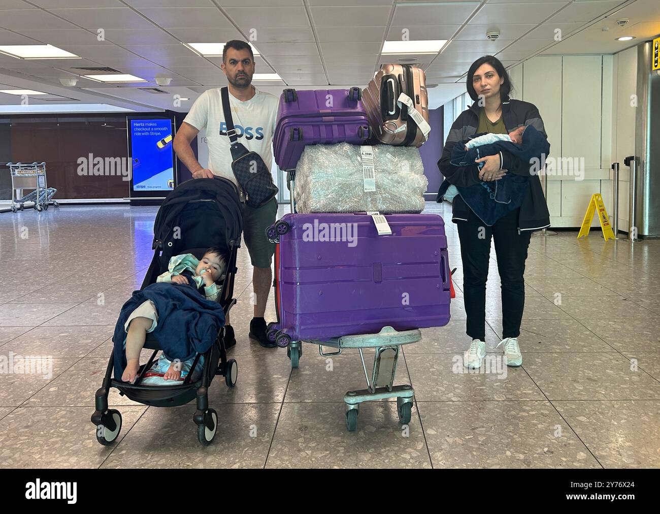 Abbas Chamseddin with his wife Sana and their two sons Zien and Jawad ...