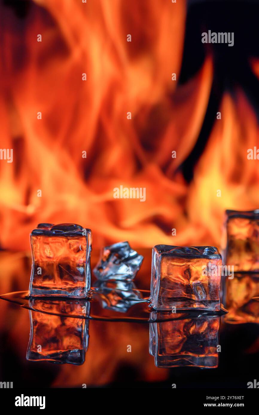 ice cubes and crushed ice versus fire Stock Photo - Alamy