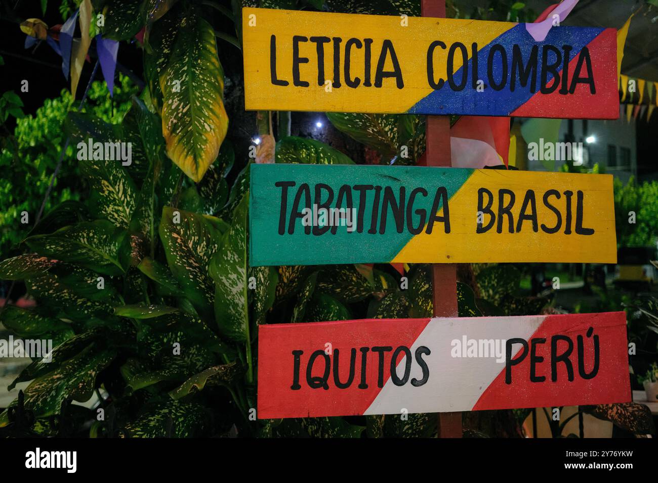 street signs in amazon triangle of Brazil Peru Colombia Stock Photo - Alamy