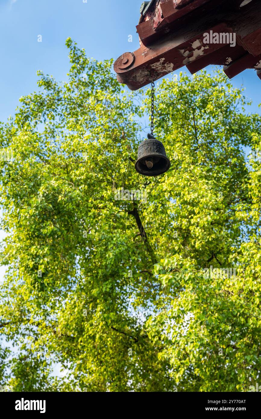 Old bell hanging on the old temple Stock Photo - Alamy